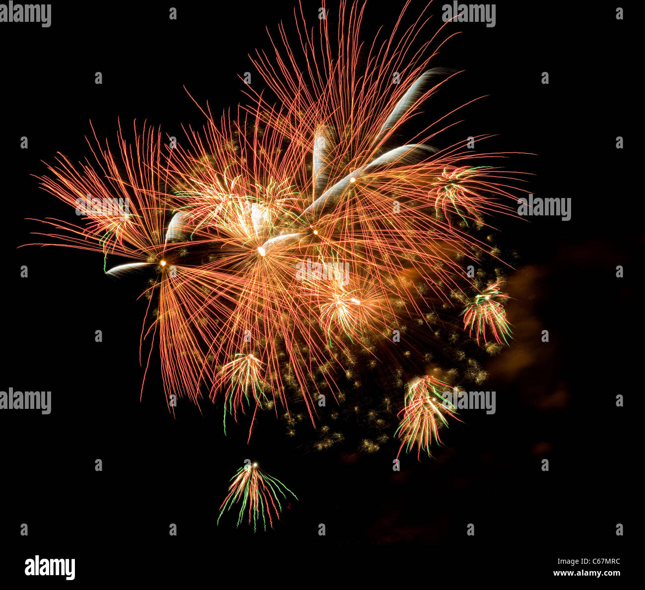 Gold and red firework display at the British Firework championships ...