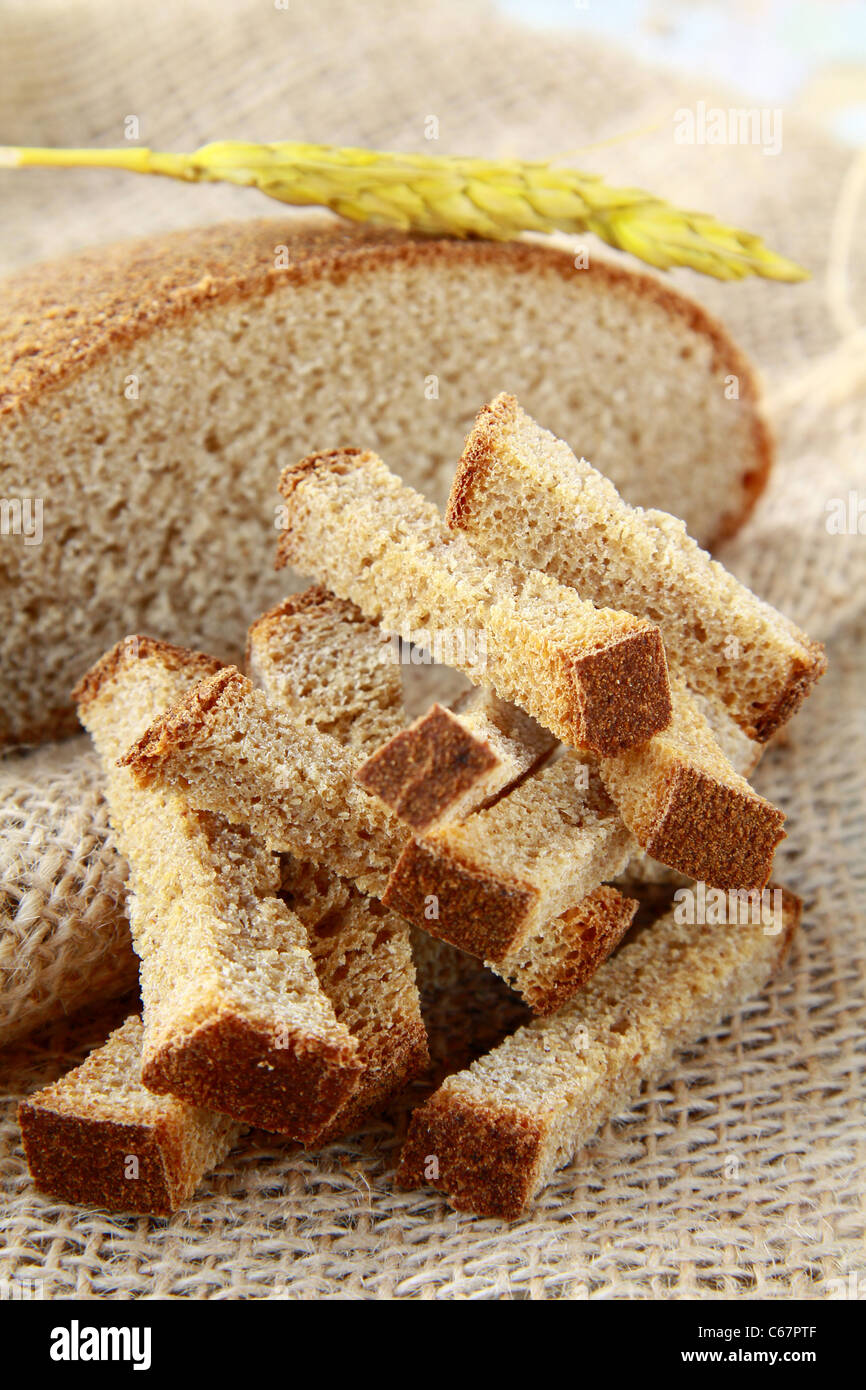 Rye bread croutons on linseed bag hi-res stock photography and images ...
