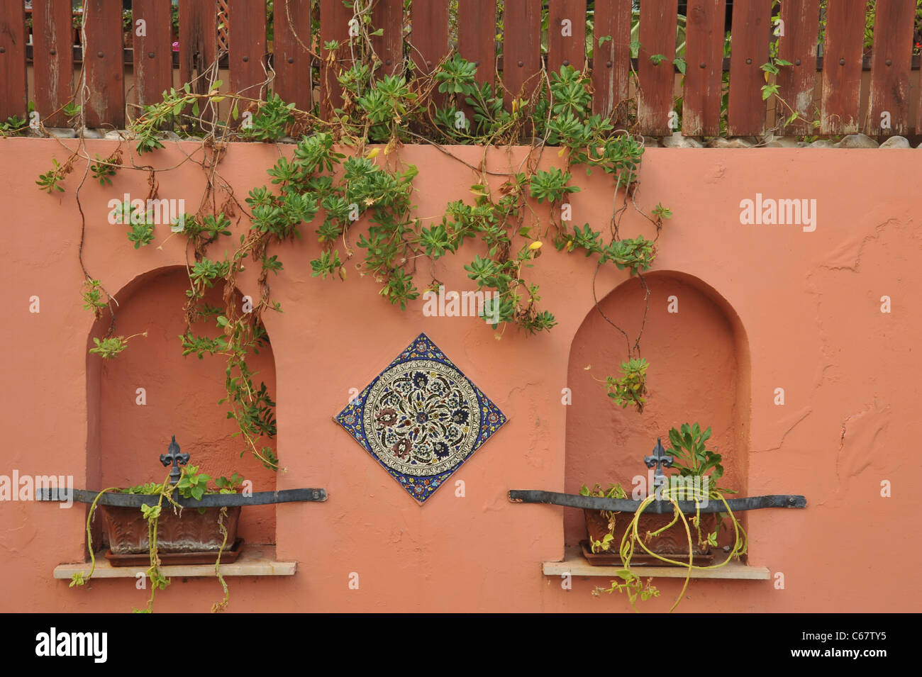 wall with sign piety Stock Photo - Alamy