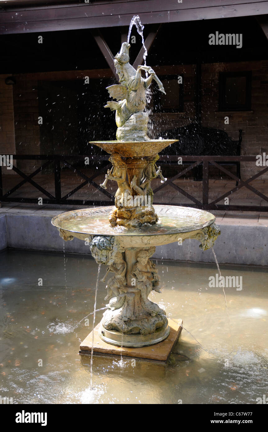 Roman style ornamental fountain Stock Photo - Alamy