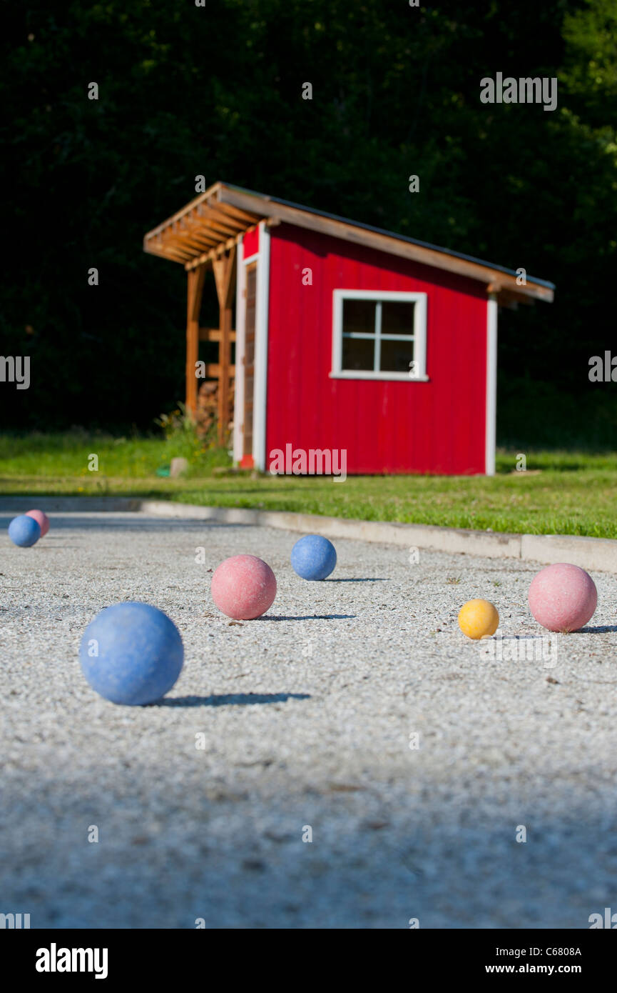 Red barn with bocce ball Stock Photo - Alamy