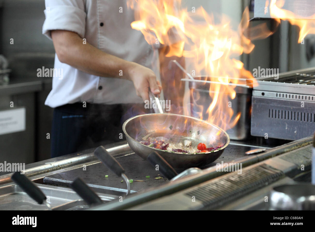 fire chef cook cooking Stock Photo - Alamy
