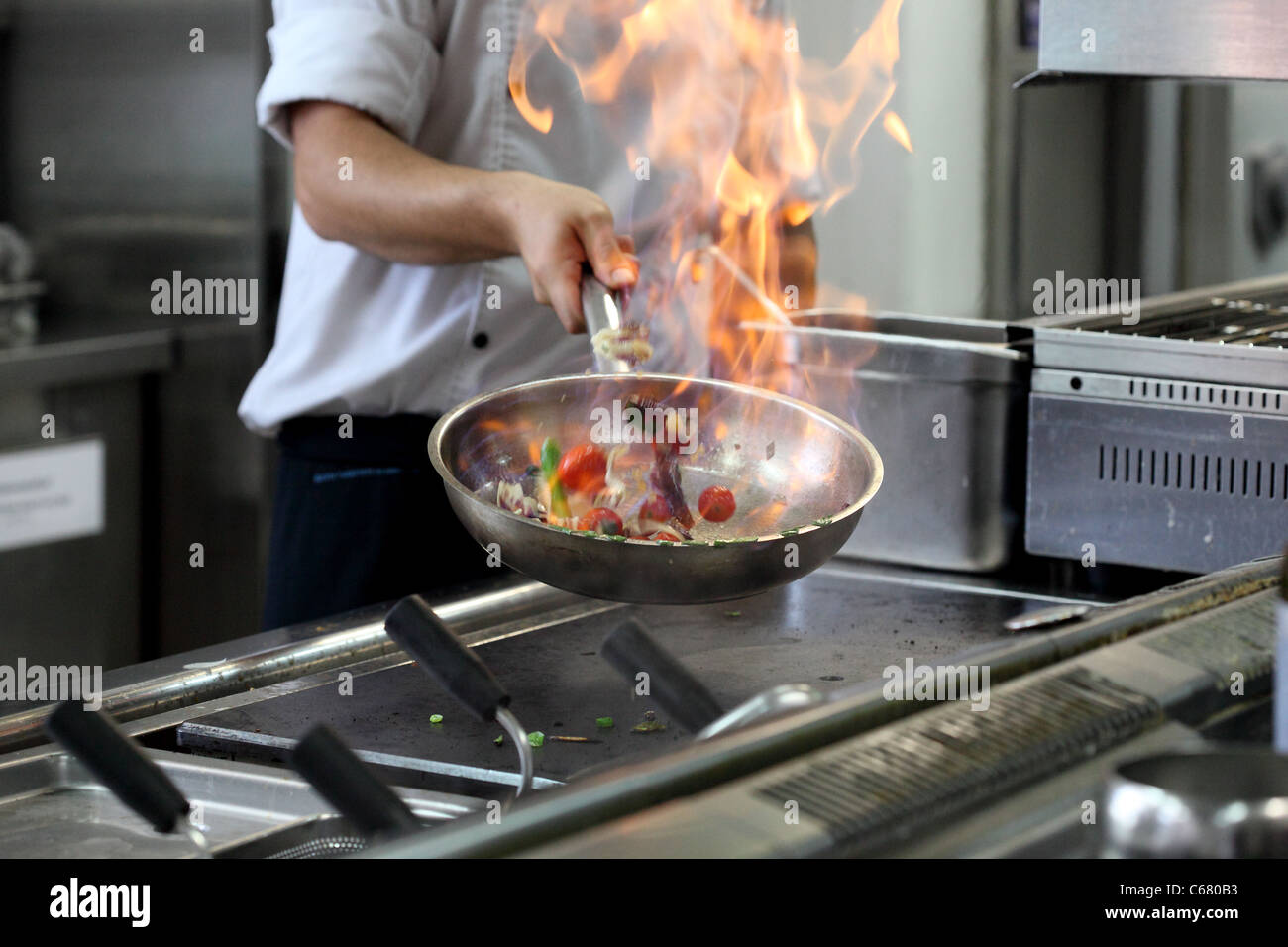 fire chef cook cooking Stock Photo - Alamy