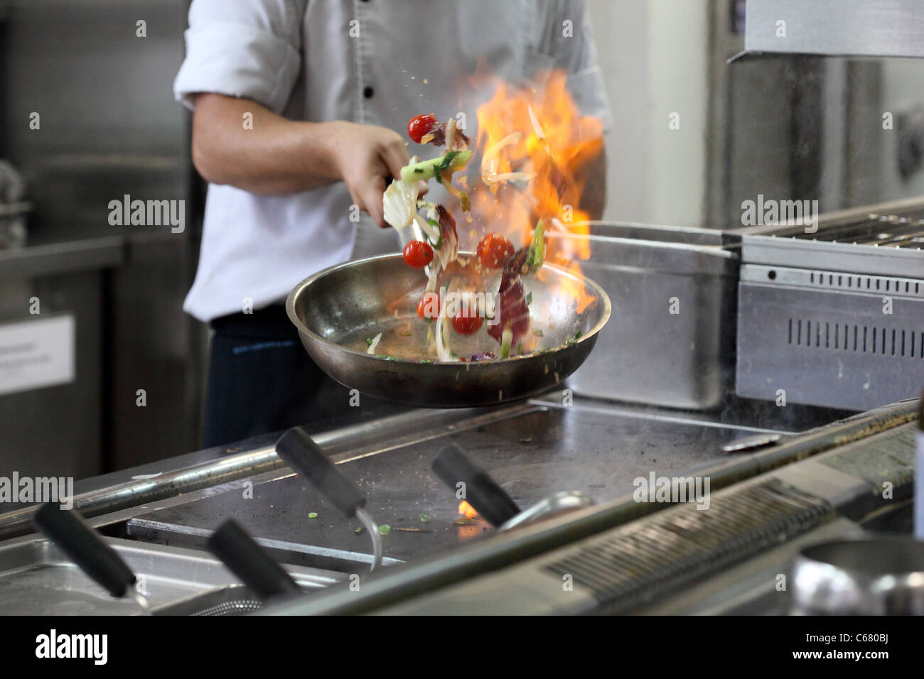 fire chef cook cooking Stock Photo - Alamy