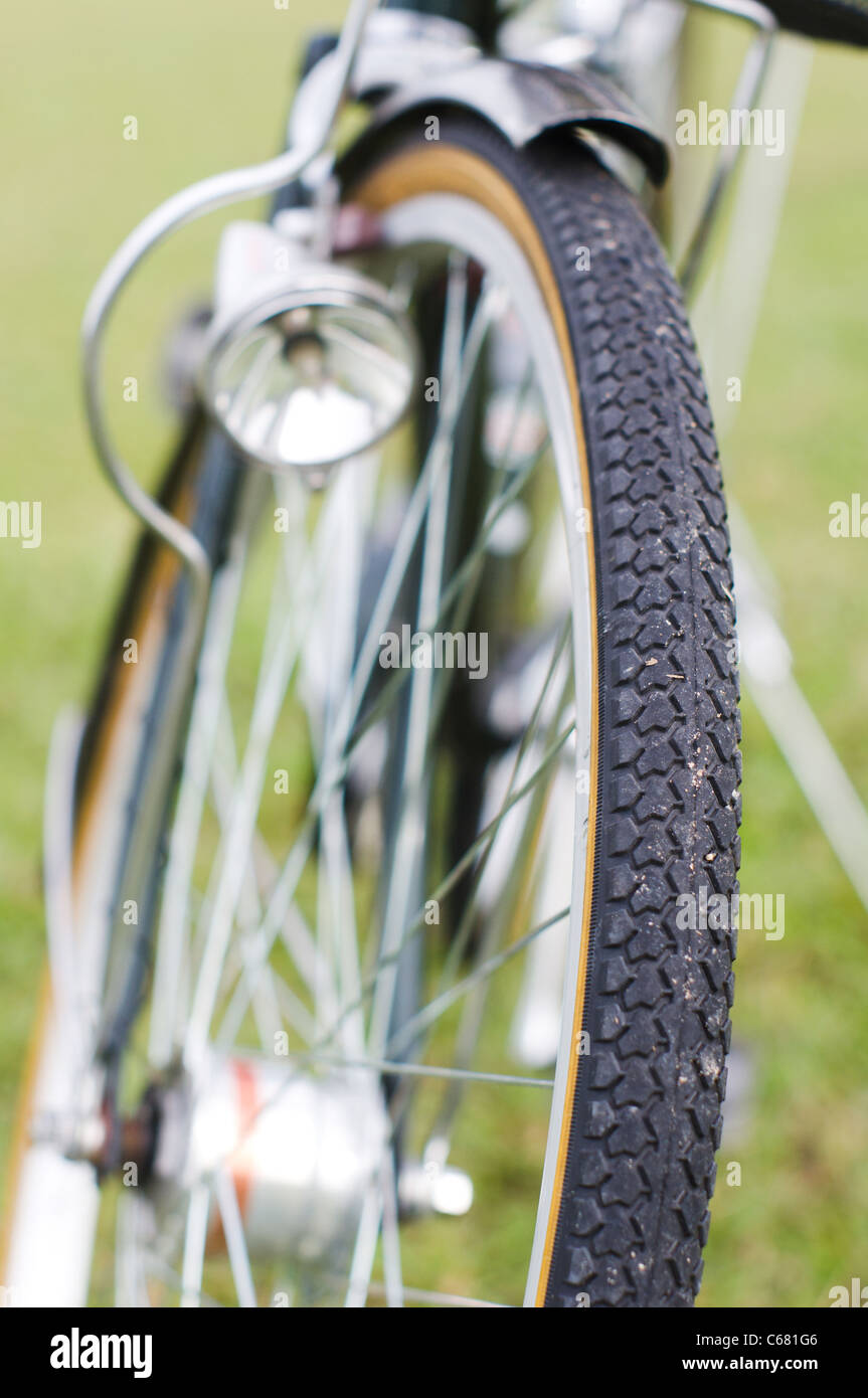 close up of front wheel of bicycle, with front light Stock Photo - Alamy