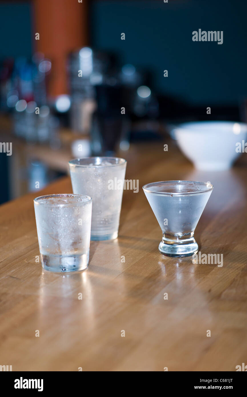 Three cocktails on a bar Stock Photo - Alamy