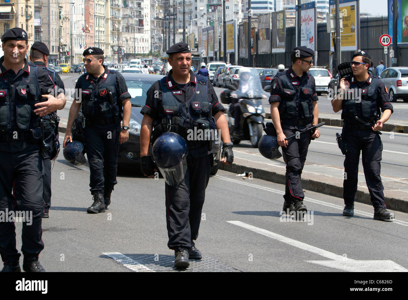 Police officers with riot gear at large employment protest on street of ...