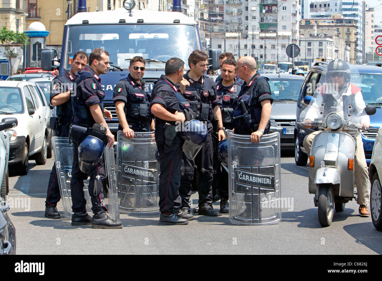 Police officers with riot gear at large employment protest on street of ...