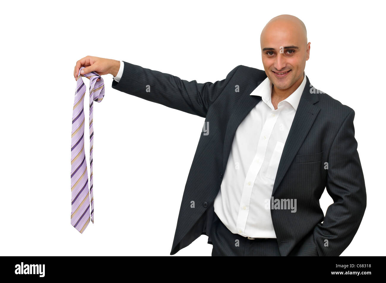 Businessman taking off his tie isolated in white Stock Photo - Alamy