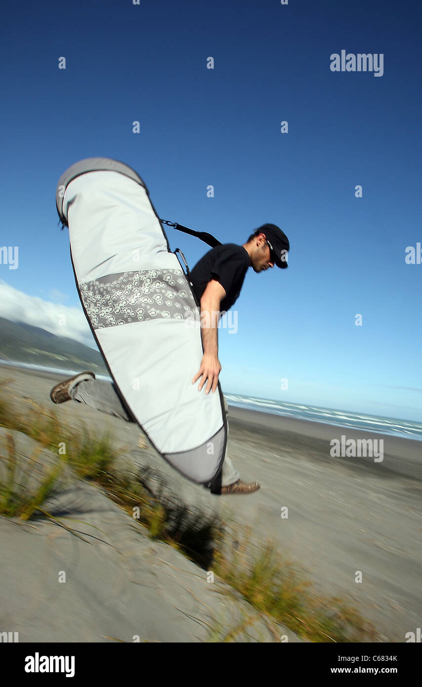 Surfer running down water hi-res stock photography and images - Alamy