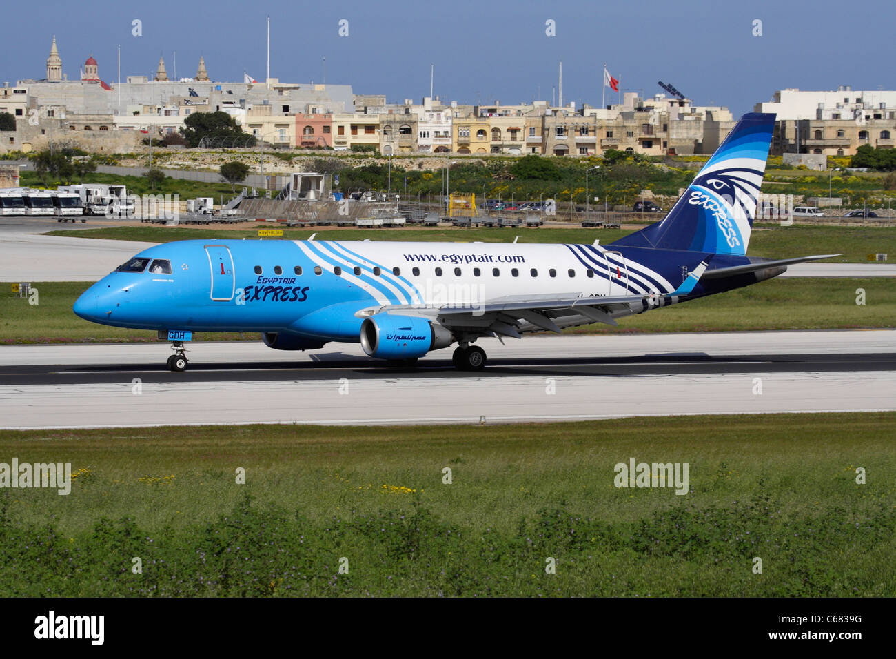 EgyptAir Express Embraer 170 small passenger jet airliner on the runway ...