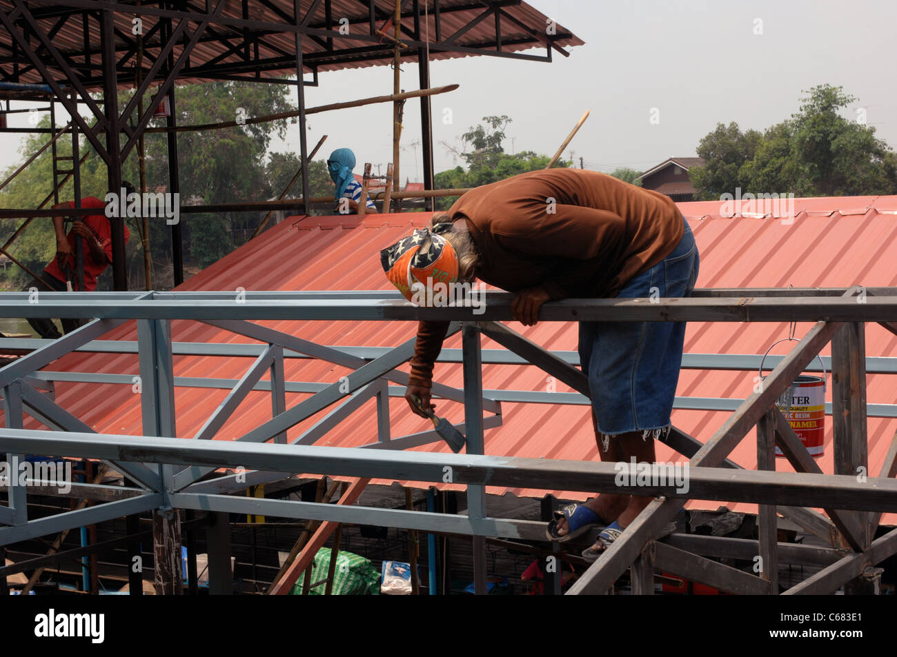 Workman soldering, Ayutthaya Thailand Stock Photo - Alamy
