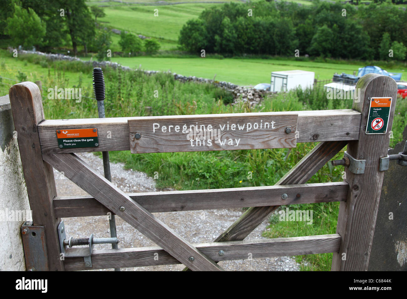 Peregrine viewpoint sign on a gate at Malham Cove, Yorkshire, Yorkshire ...