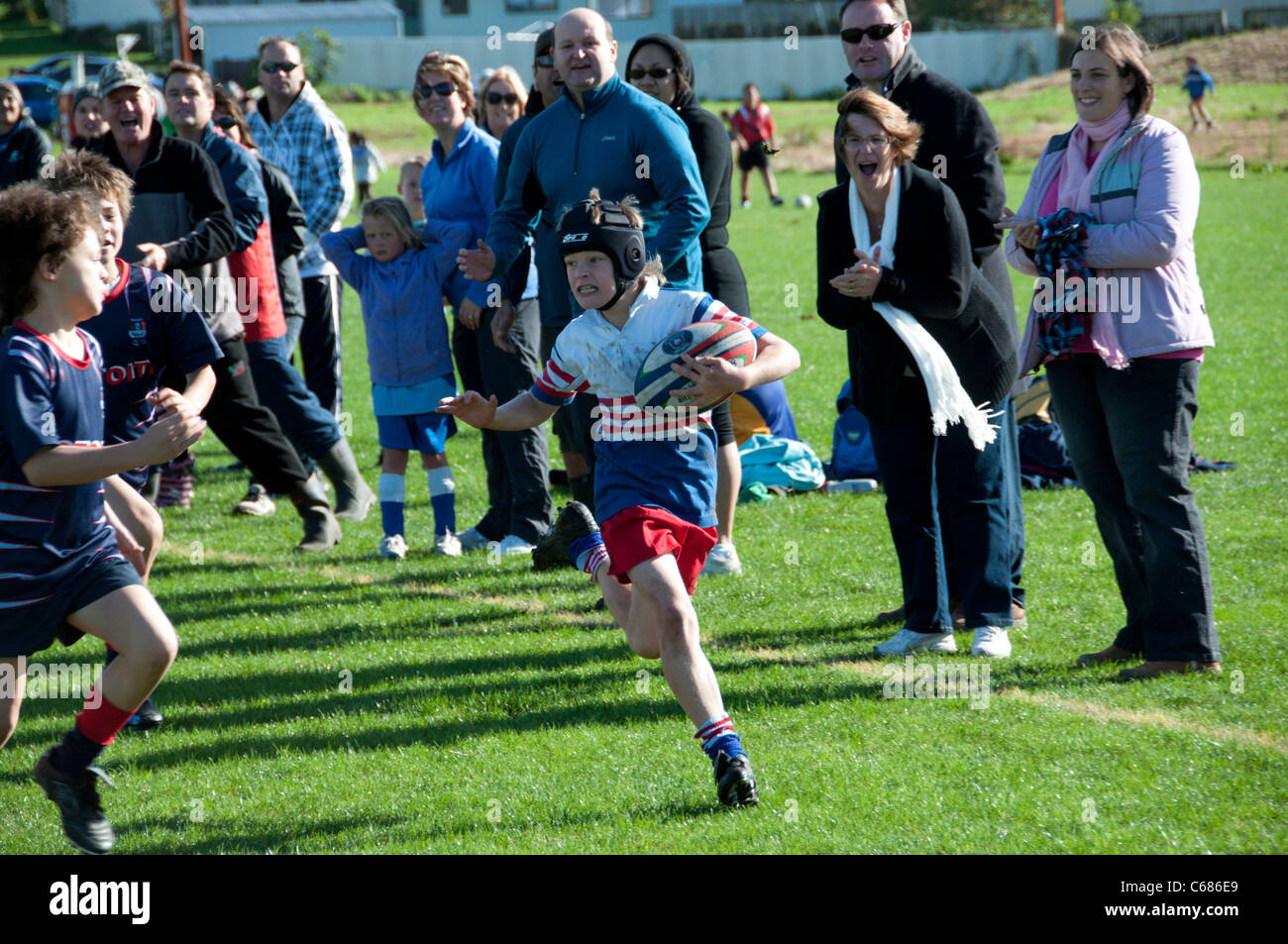 junior rugby players going for it Stock Photo - Alamy