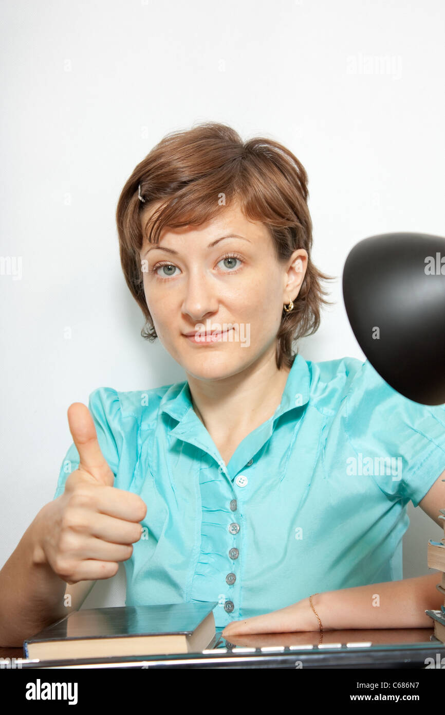 Young woman indicating ok sign Stock Photo - Alamy