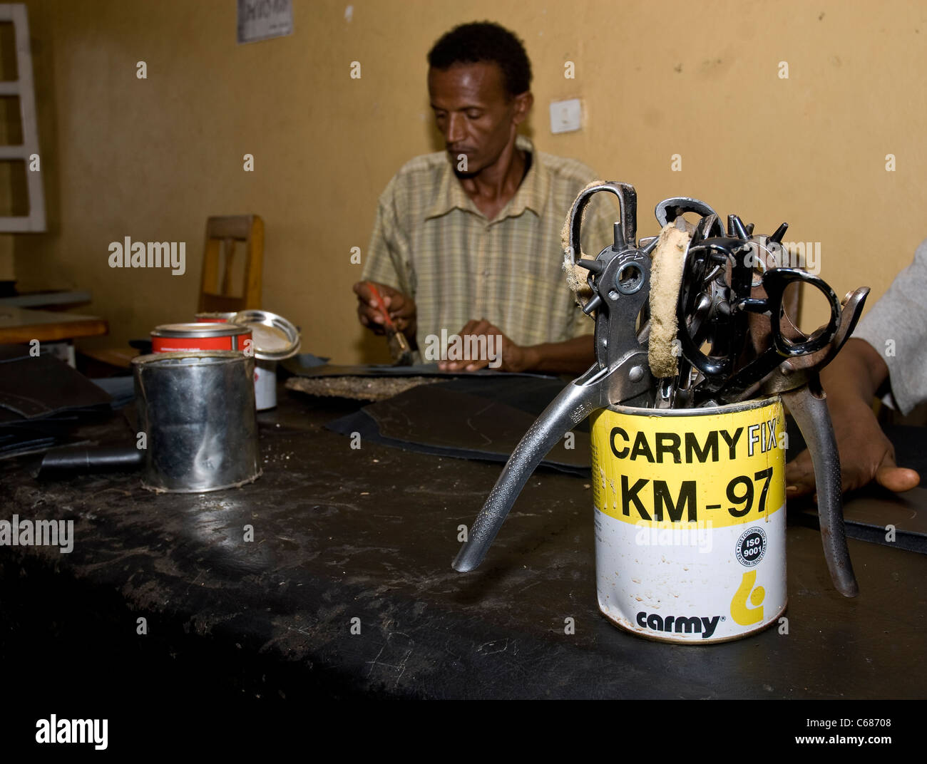 Shoe makers; making shoe's for patients with podoconiosis at the shoe ...