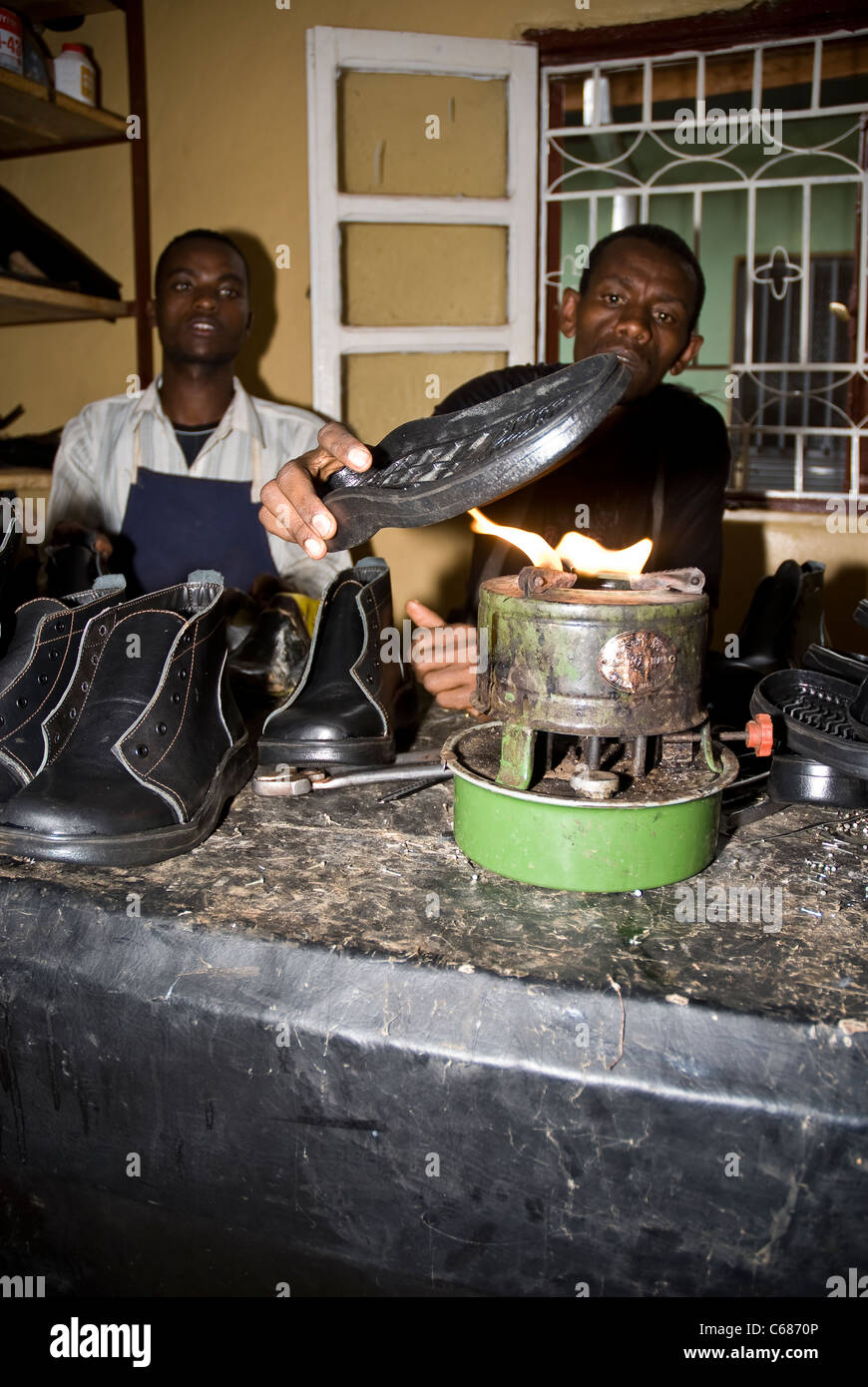 Shoe makers; making shoe's for patients with podoconiosis at the shoe ...