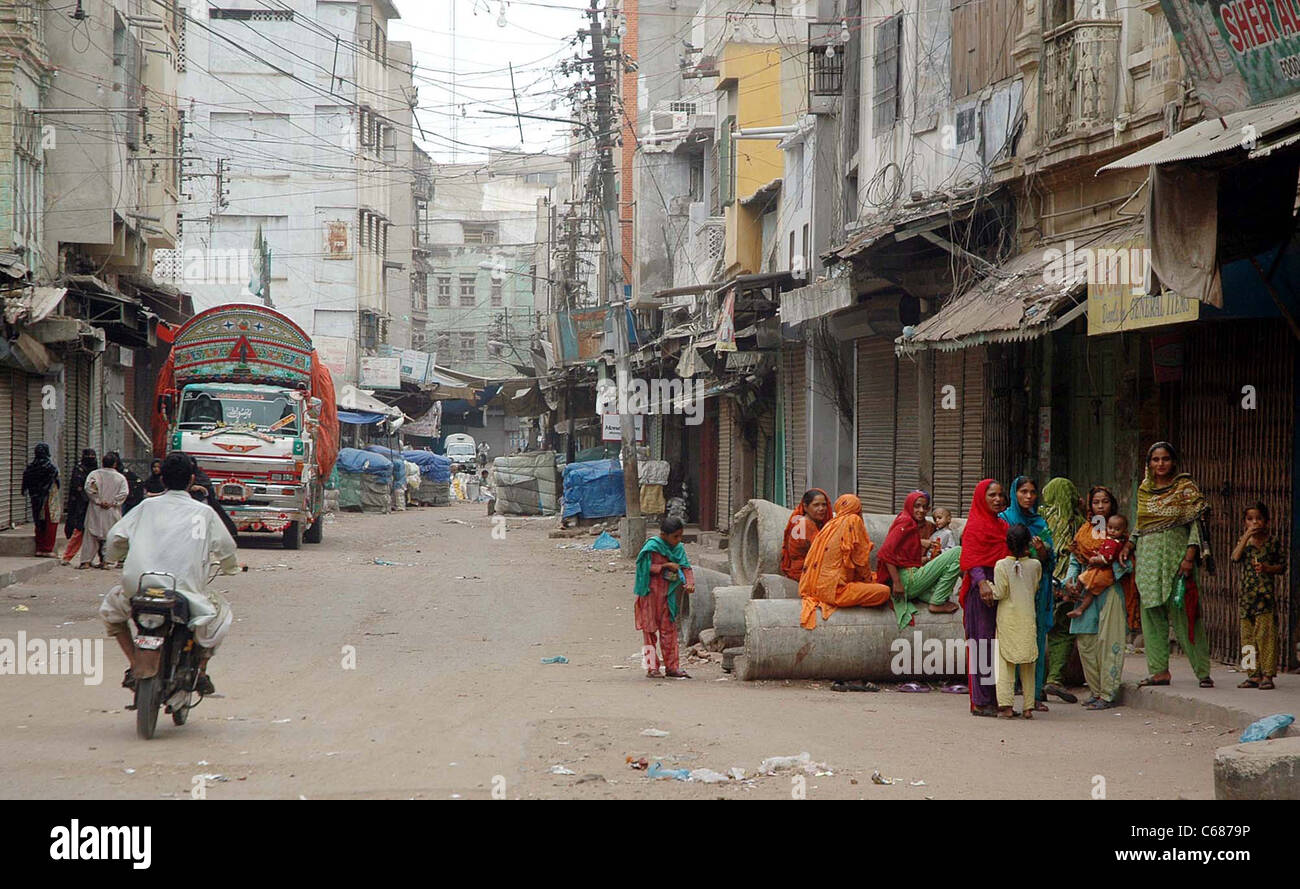 Shops are seen closed at Jodia Bazaar due to violence in Karachi on ...