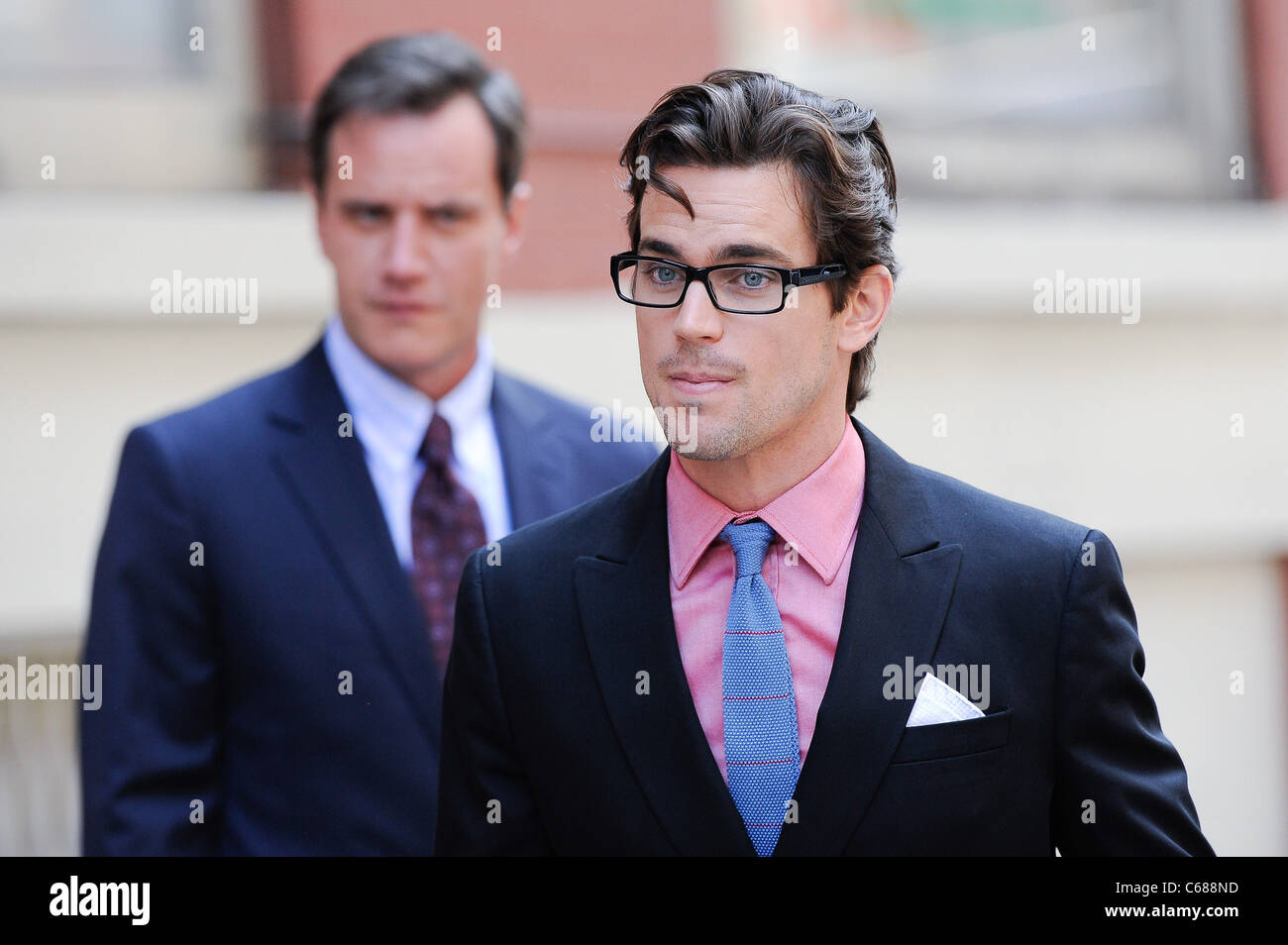 Tim DeKay, Matthew Bomer, film a scene at the 'White Collar' movie set ...