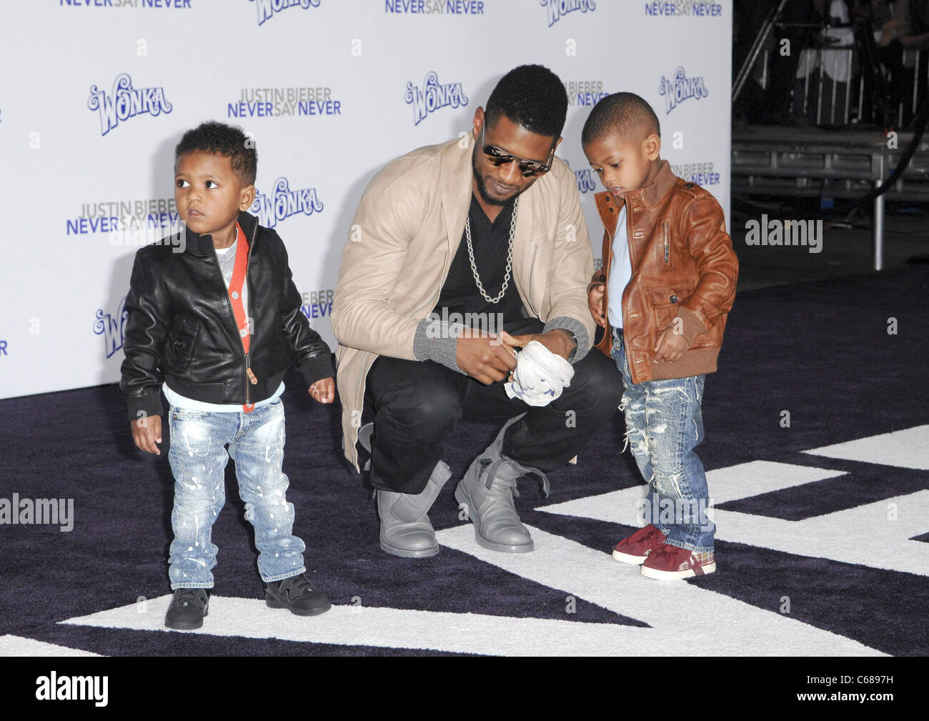 Usher, kids at arrivals for JUSTIN BIEBER: NEVER SAY NEVER Premiere ...