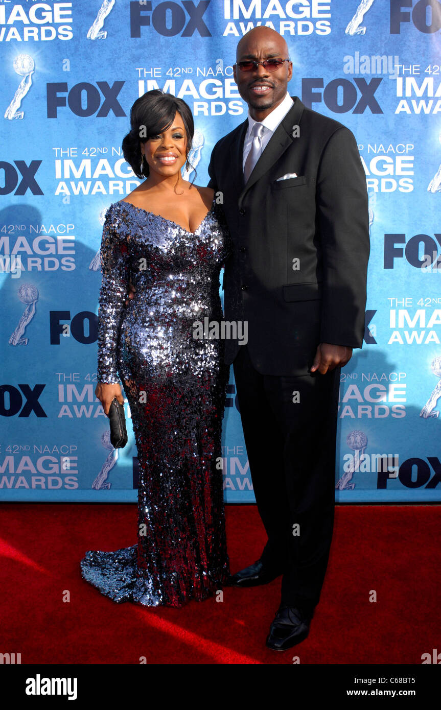 Niecy Nash, Jay Tucker at arrivals for 42nd NAACP Image Awards, Shrine ...