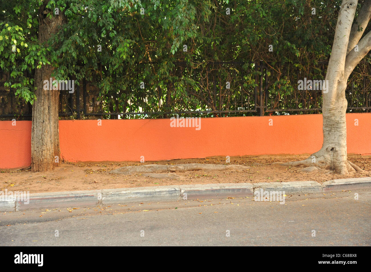 orange wall fence Stock Photo - Alamy