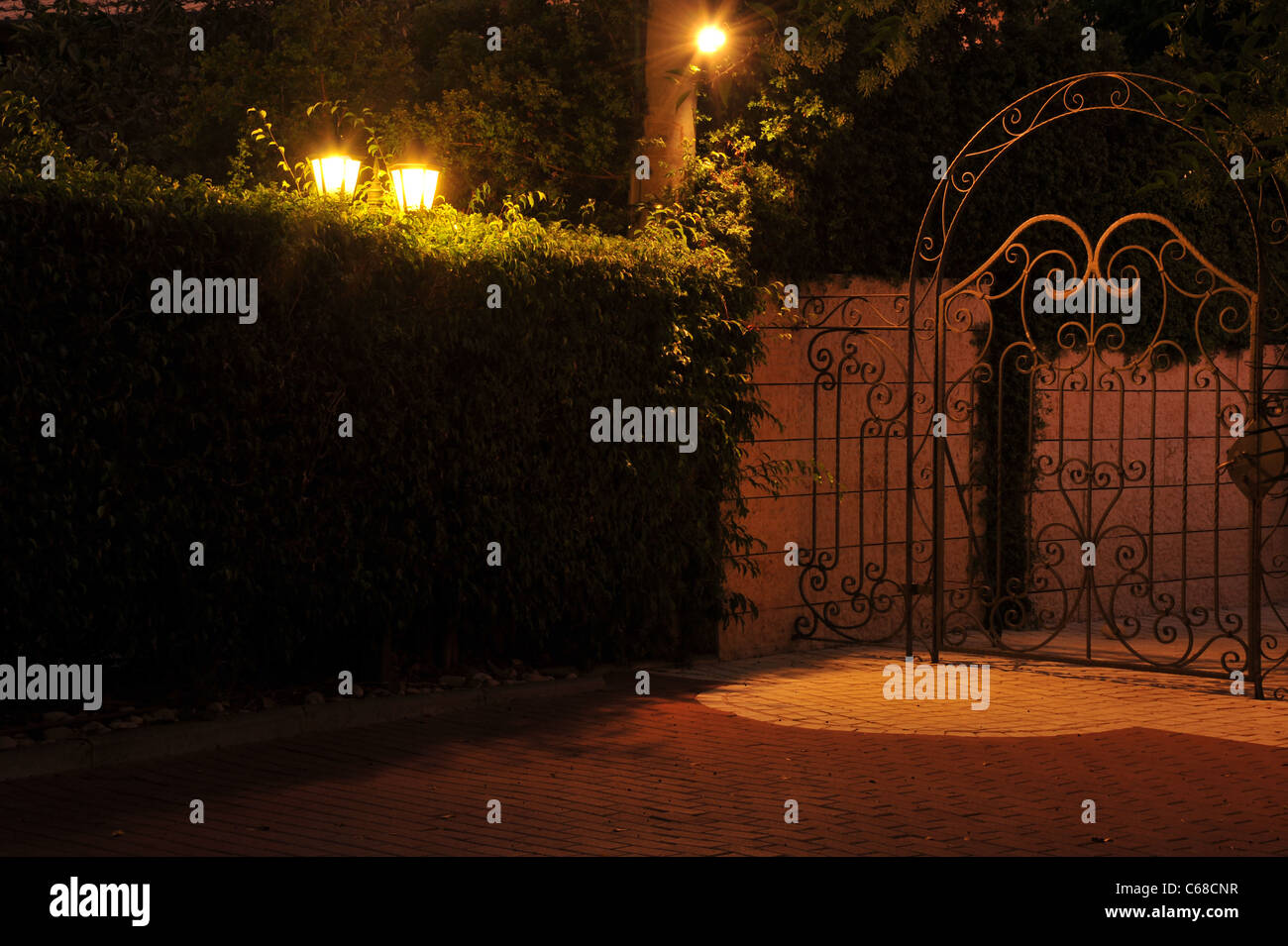 gate at night Stock Photo - Alamy