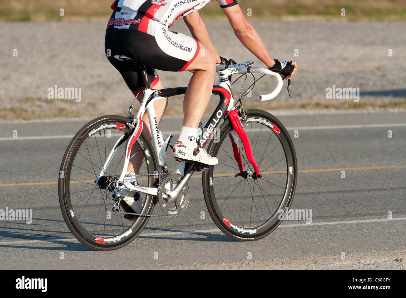 Sportsman on the bike Stock Photo - Alamy
