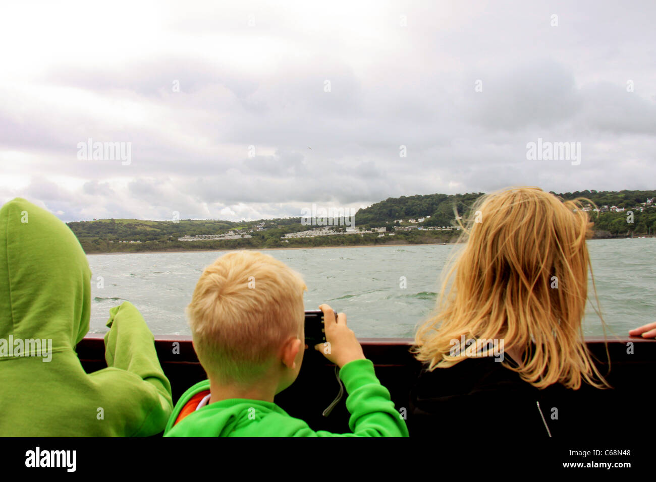Children aboard a boat in New Quay Cardigan Bay Stock Photo - Alamy
