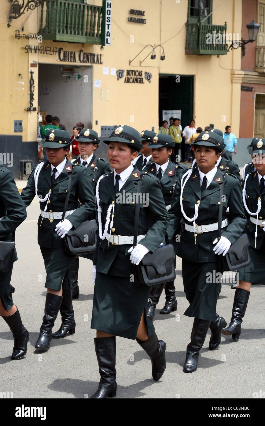Female soldiers marching during a military parade. Cajamarca, Peru ...