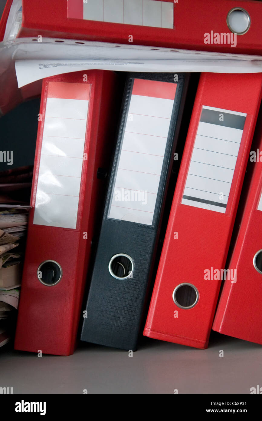 Messy case with a stack of documents Stock Photo - Alamy
