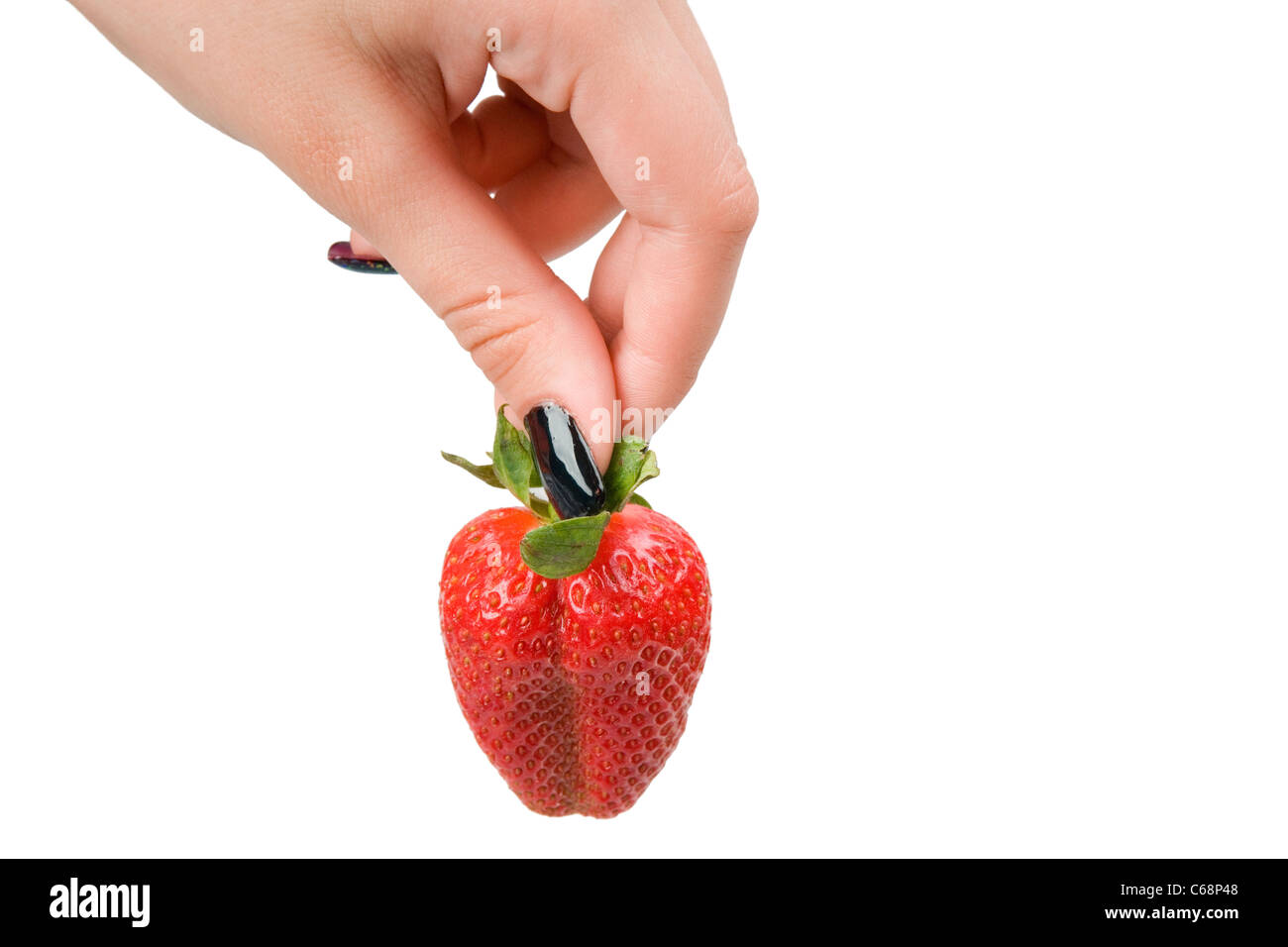Strawberry in a female hand, it is isolated on a white background Stock ...