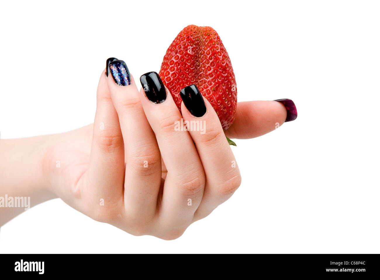 Strawberry in a female hand, it is isolated on a white background Stock ...
