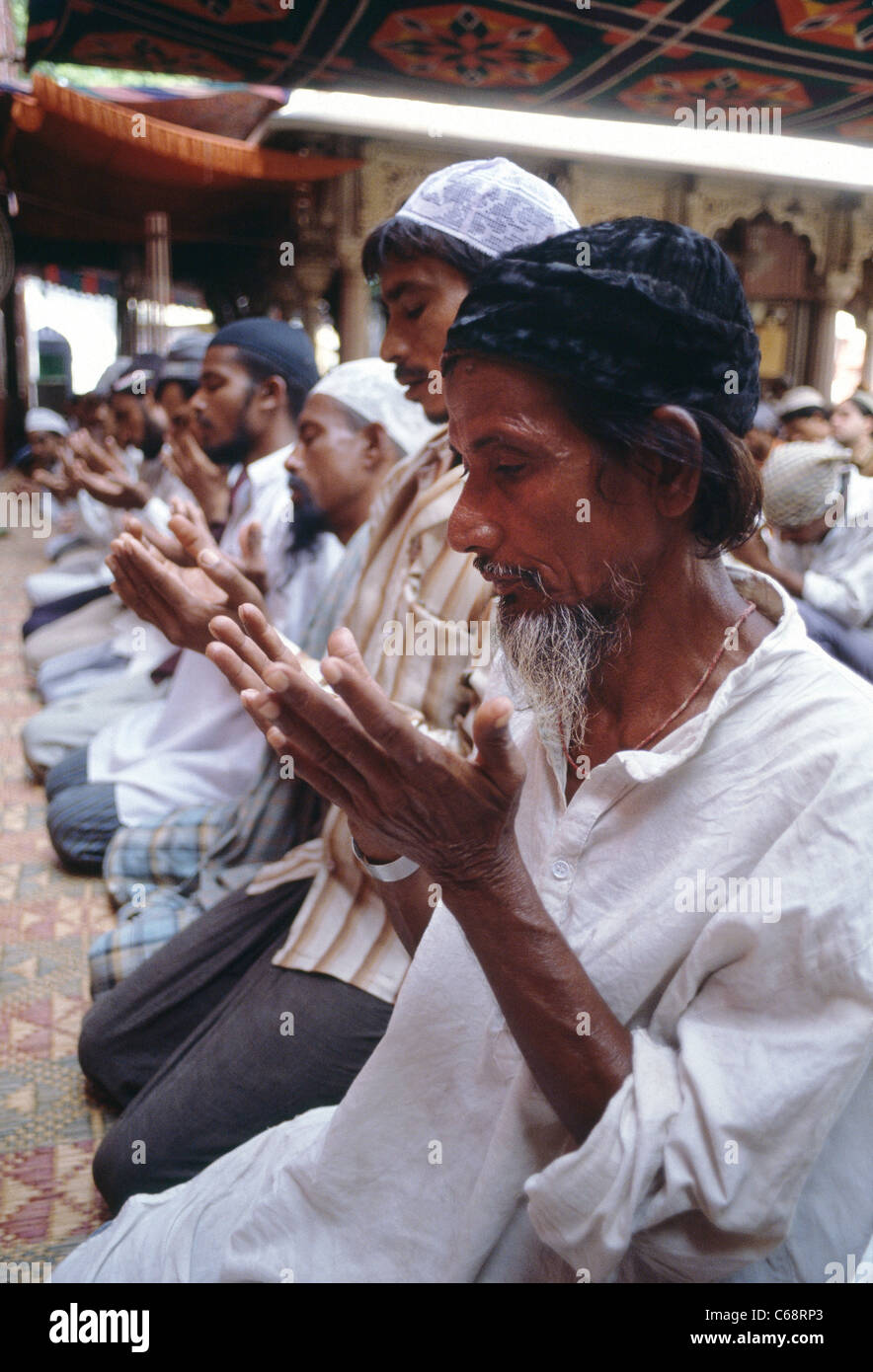 Muslims pray at the Nizamuddin Mosque in New Delhi, India.There are ...