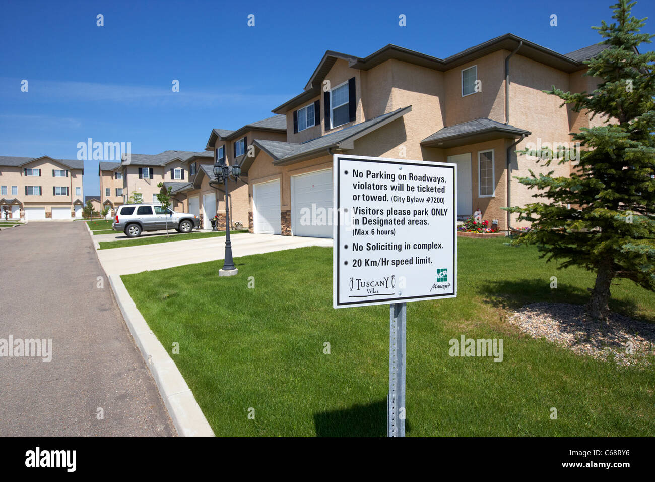 management rules signpost in front of semi detached condominium ...
