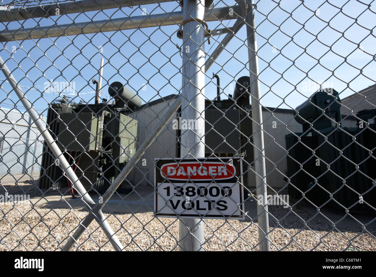 danger 138000 volts sign on town power transformer local electricity ...