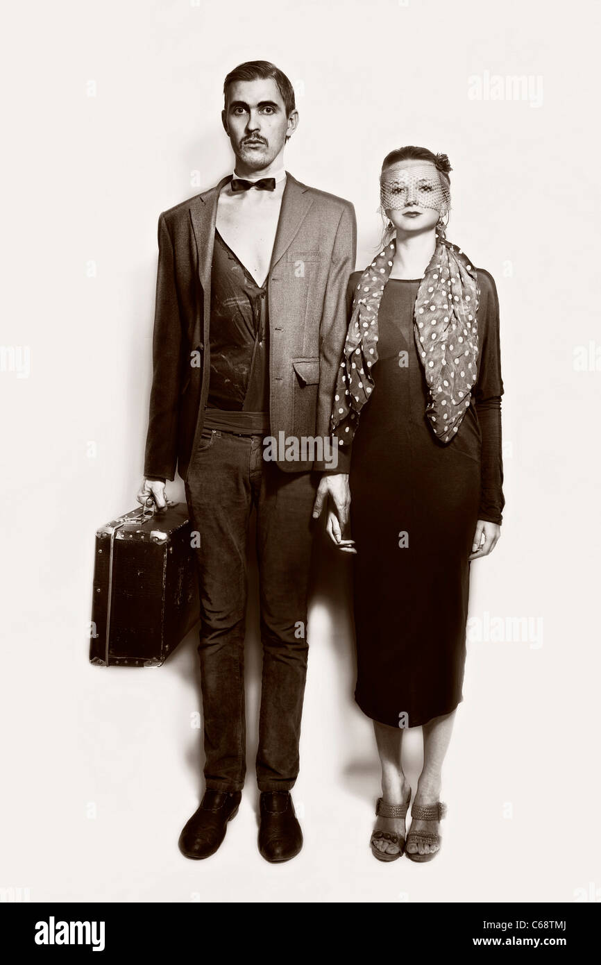 Young couple theater actors in a retro style on a white background ...