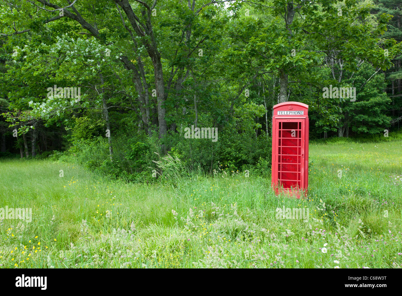 Red British telephone booth in the country Maine USA Stock Photo - Alamy