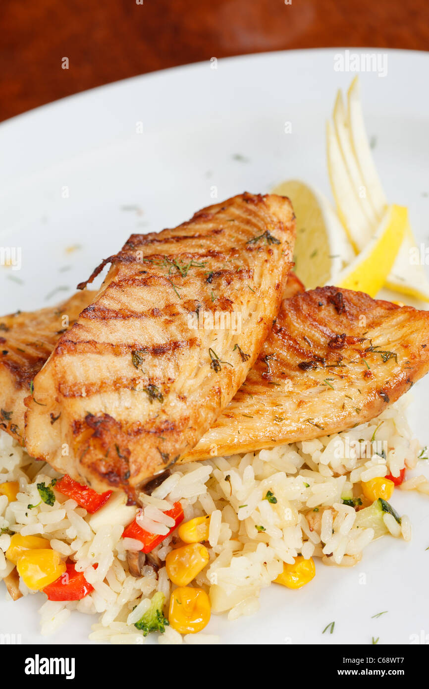 fish steak with rice Stock Photo - Alamy