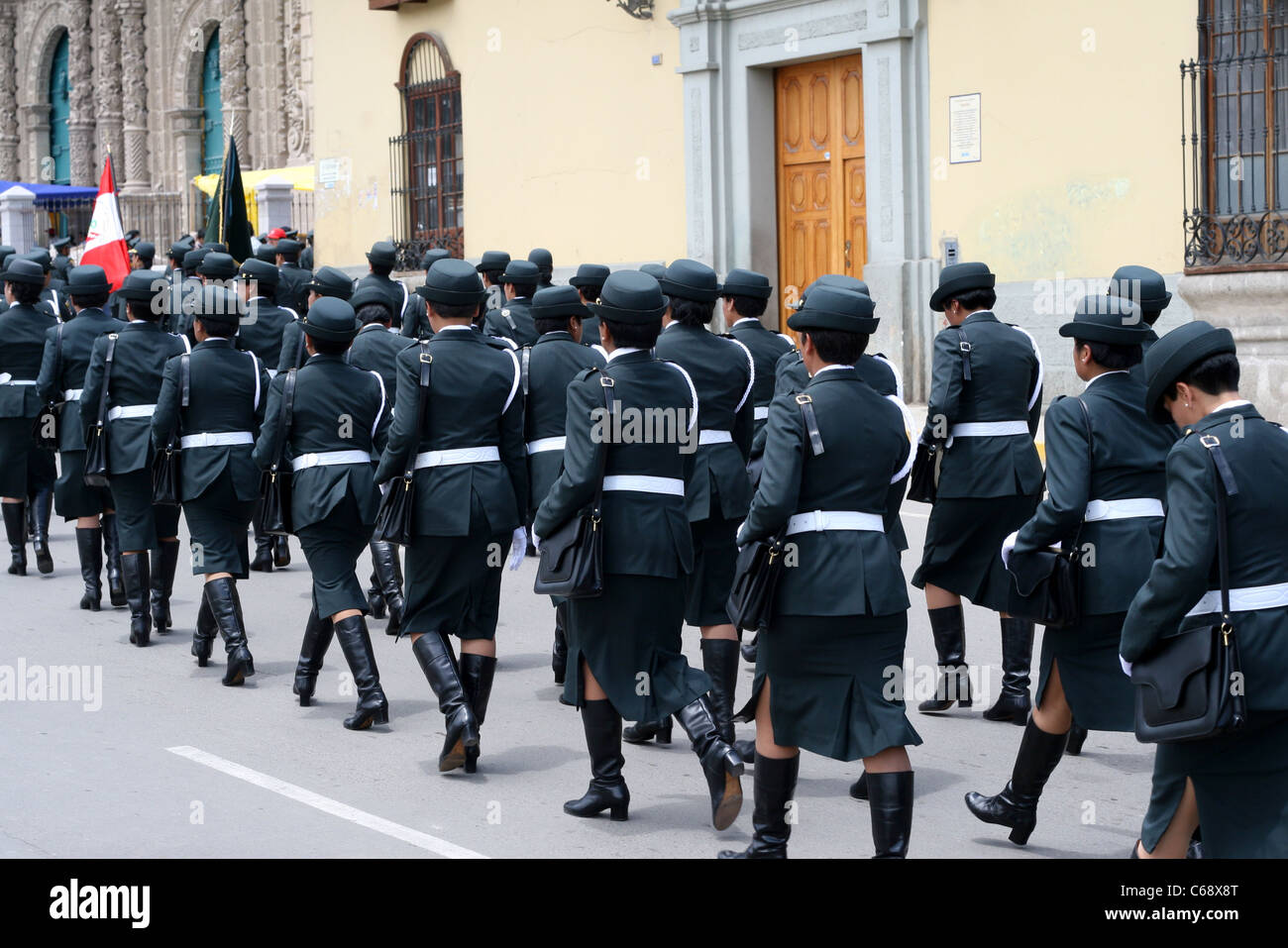 Female soldiers marching during a military parade. Cajamarca, Peru ...