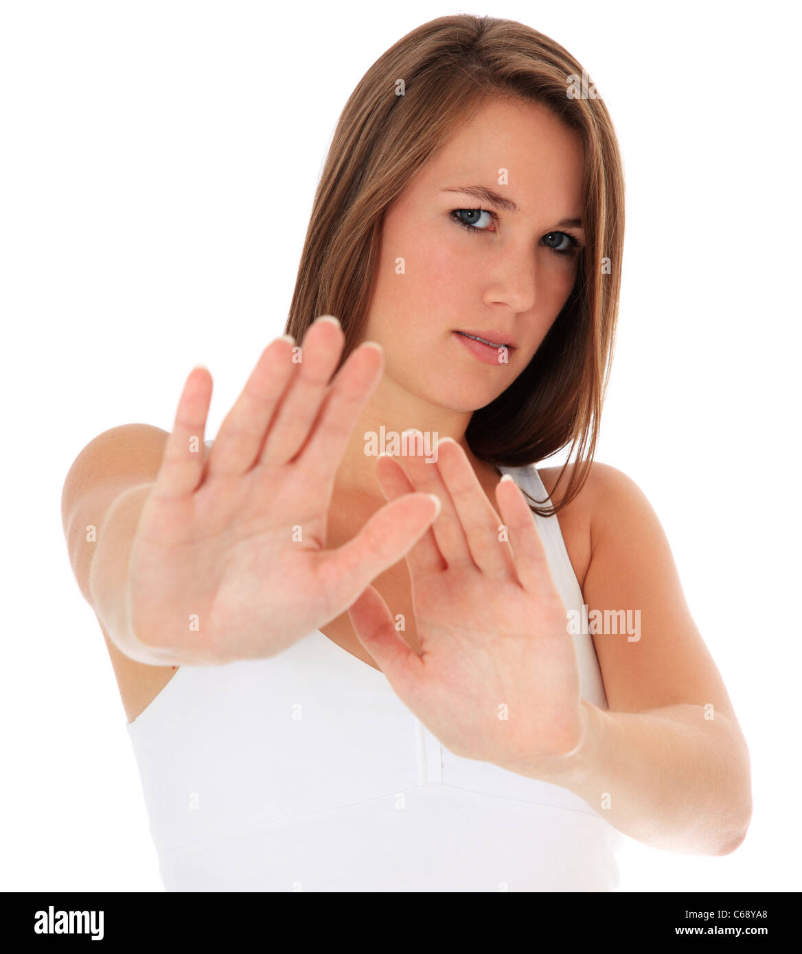 Attractive young woman making repelling gesture. All on white ...