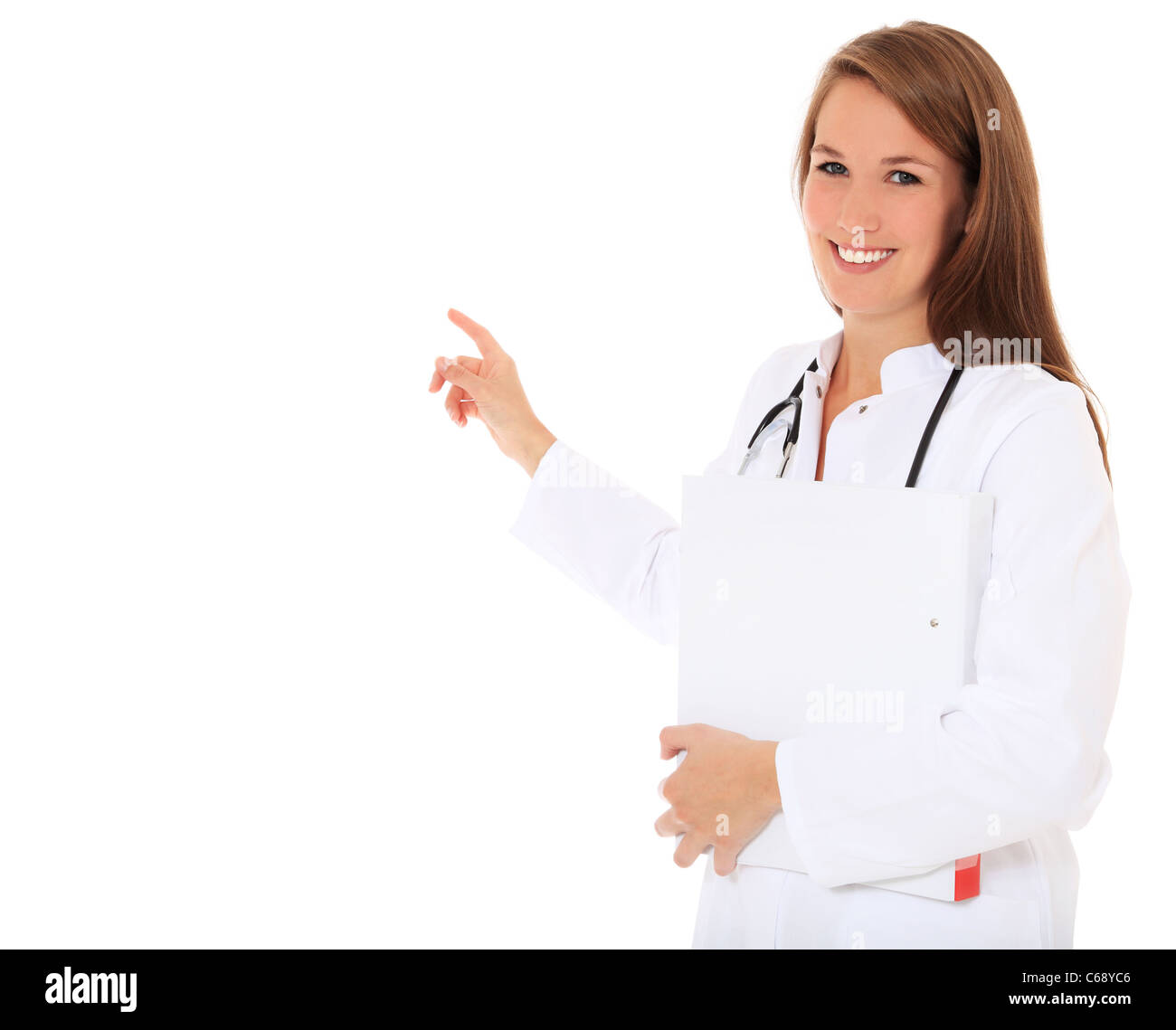 Attractive doctor pointing to the side. All on white background Stock ...