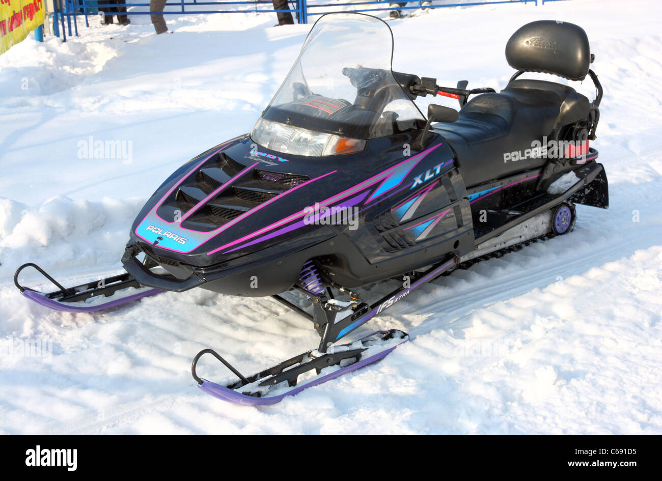 A black snowmobile Stock Photo - Alamy