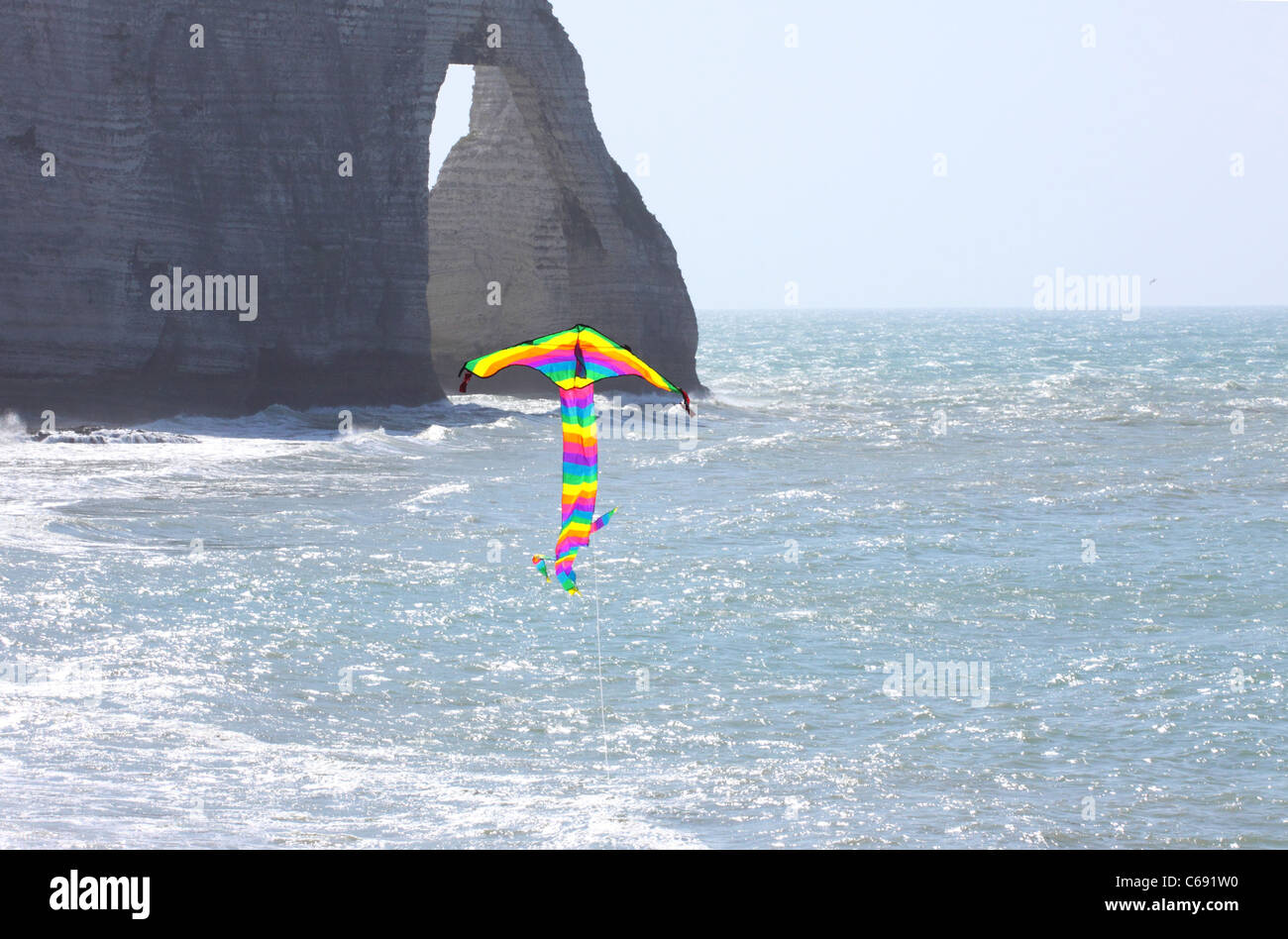 kite in a blue sky above the sea Stock Photo - Alamy