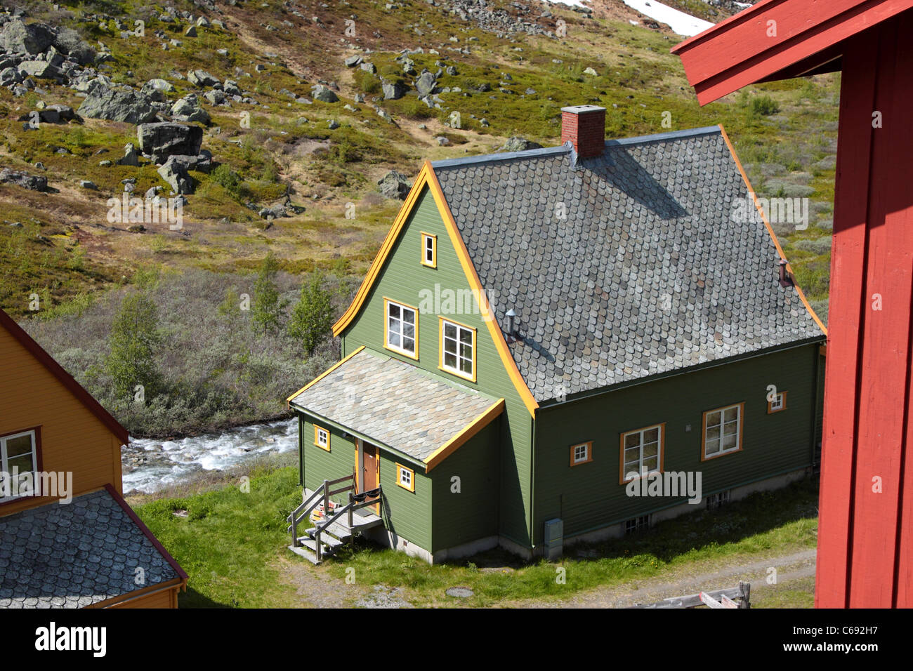 Norwegian house of colors in the mountains Stock Photo - Alamy