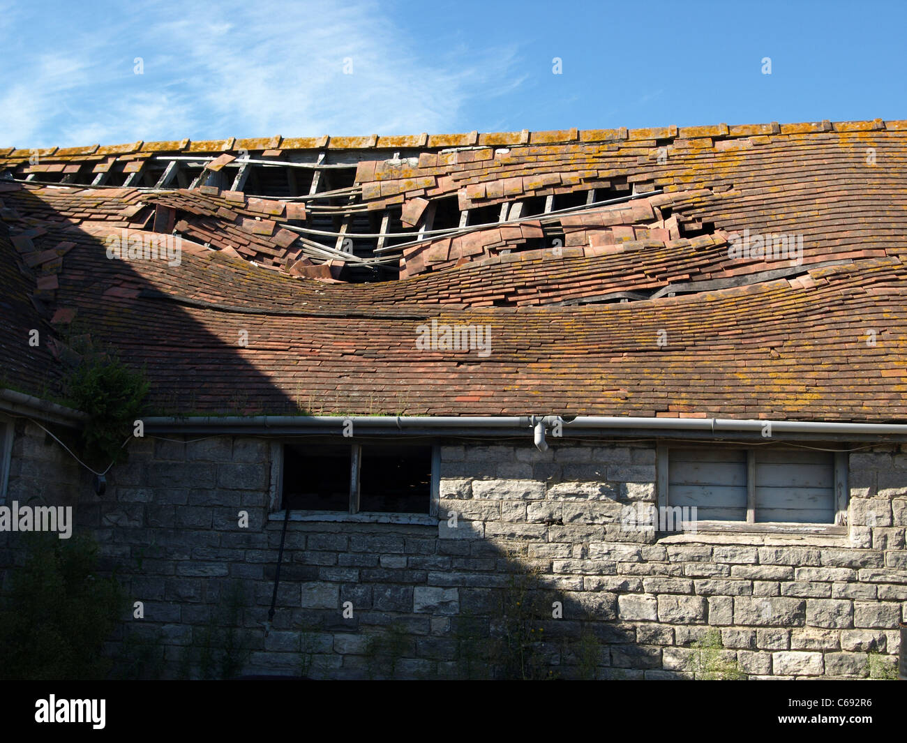 Old Barn Tiled Roof collapsing Stock Photo - Alamy Old Barn Tiled Roof collapsing Stock Photo - Alamy
