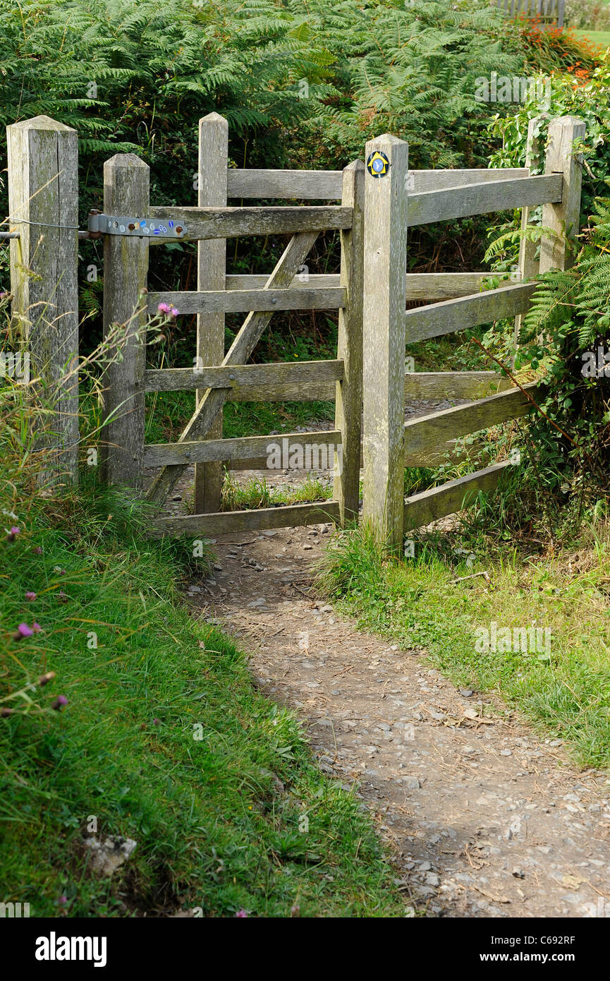 Turnstile with stickers along Moelfre coastal path, Anglesey, North ...