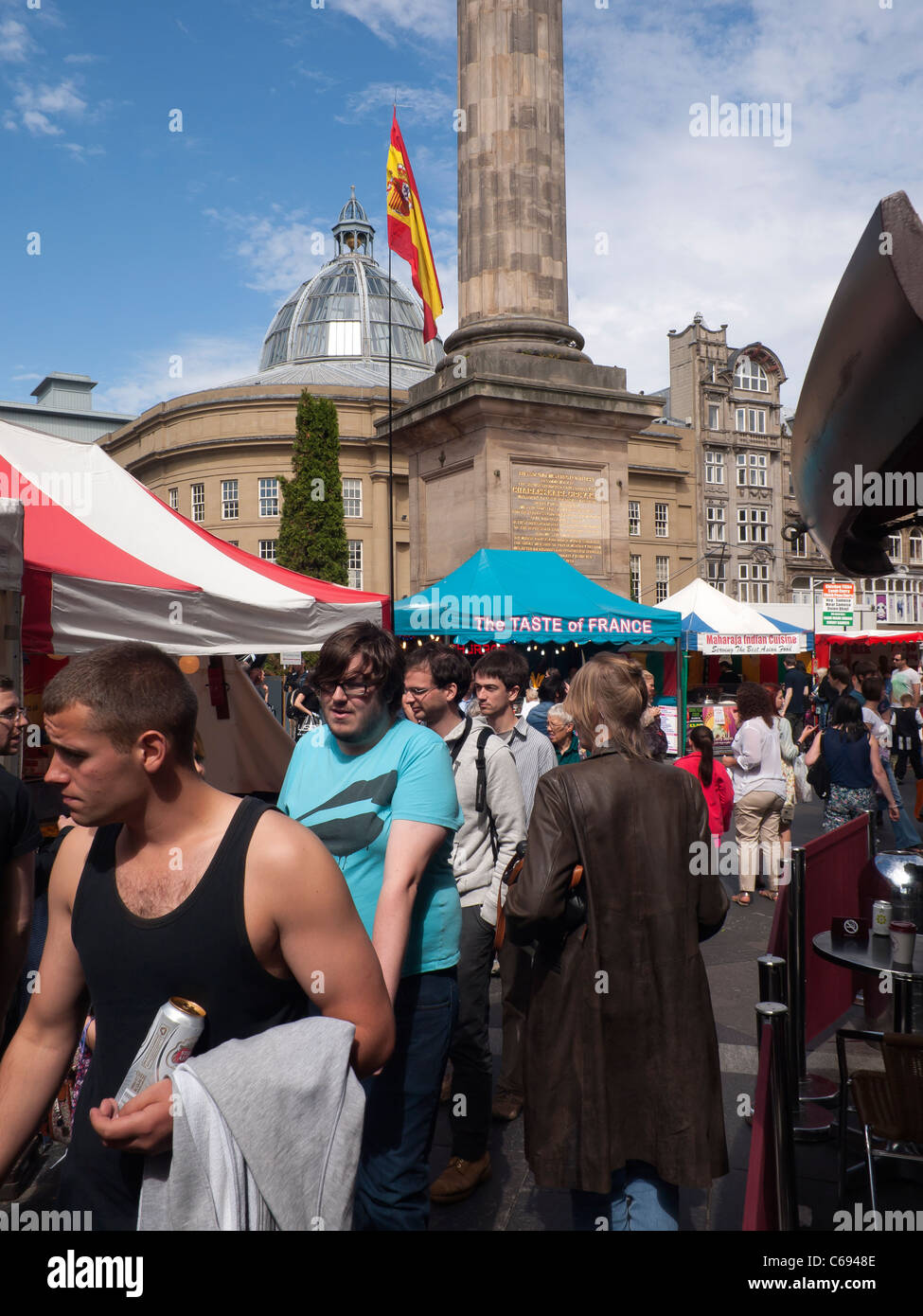 Dense crowd of people at a continental food market in Grainger Street ...
