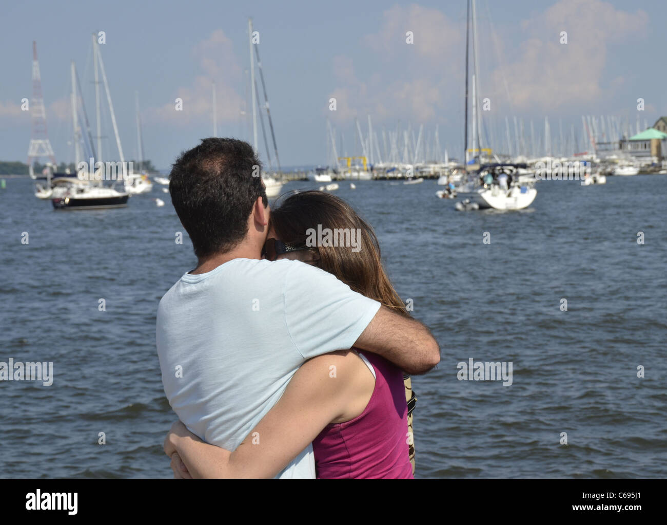 Woman watching boats hi-res stock photography and images - Alamy