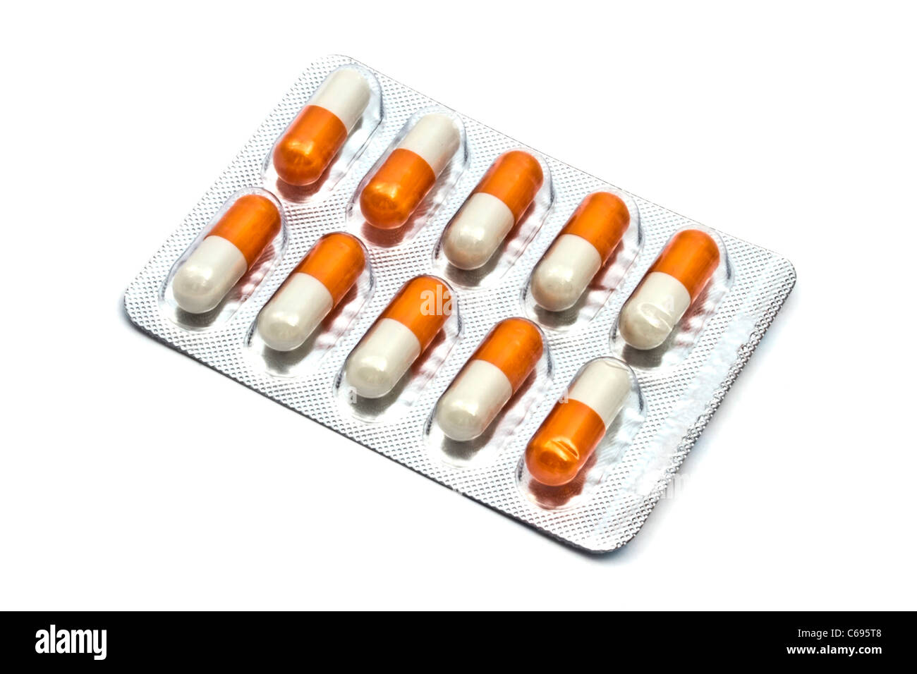 Package of capsules closeup in white background Stock Photo - Alamy